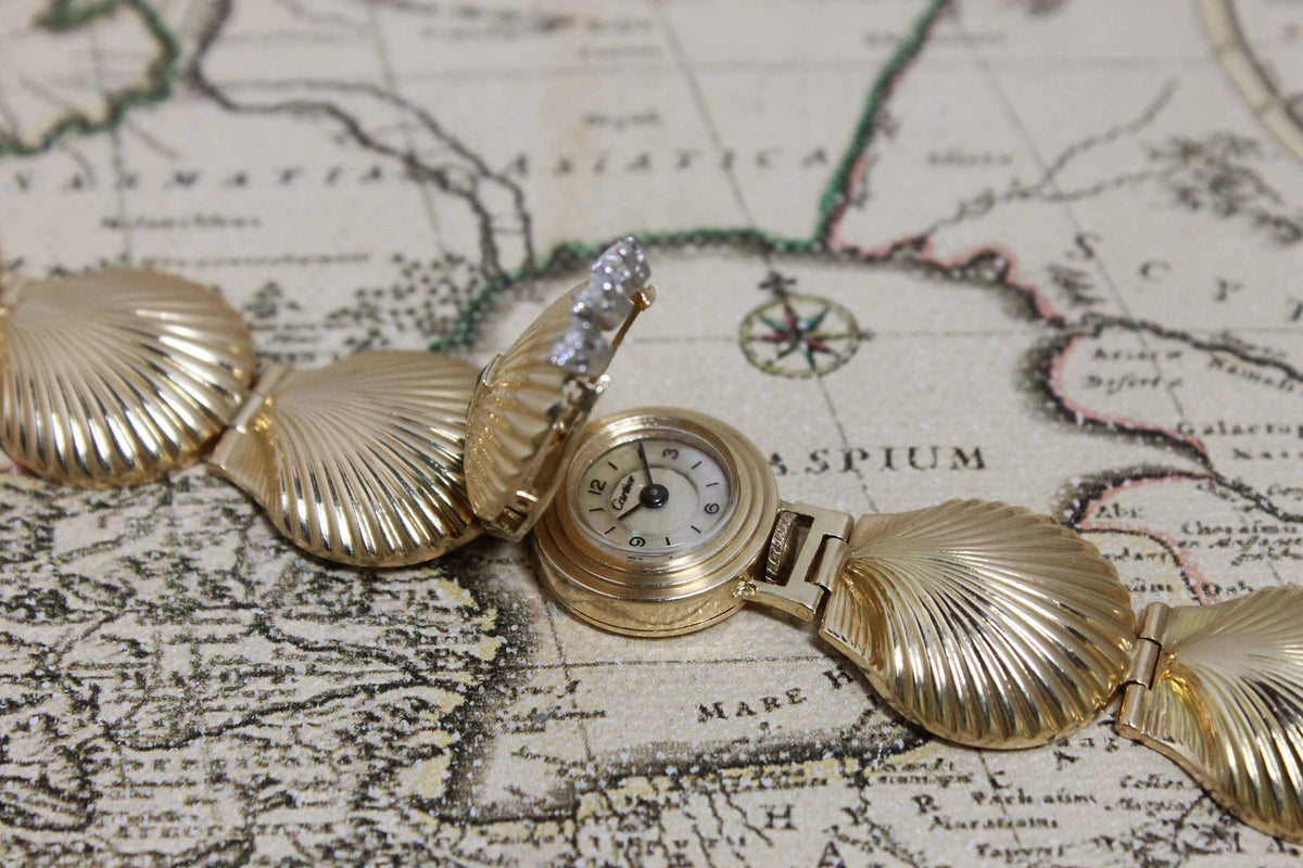 1950's Cartier Ladies 14K Shell Watch with Concealed Dial - Momentum